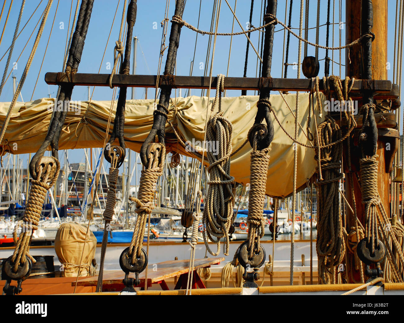 wood roll tackle rigging ropes fasten sailing boat sailboat rowing boat ...