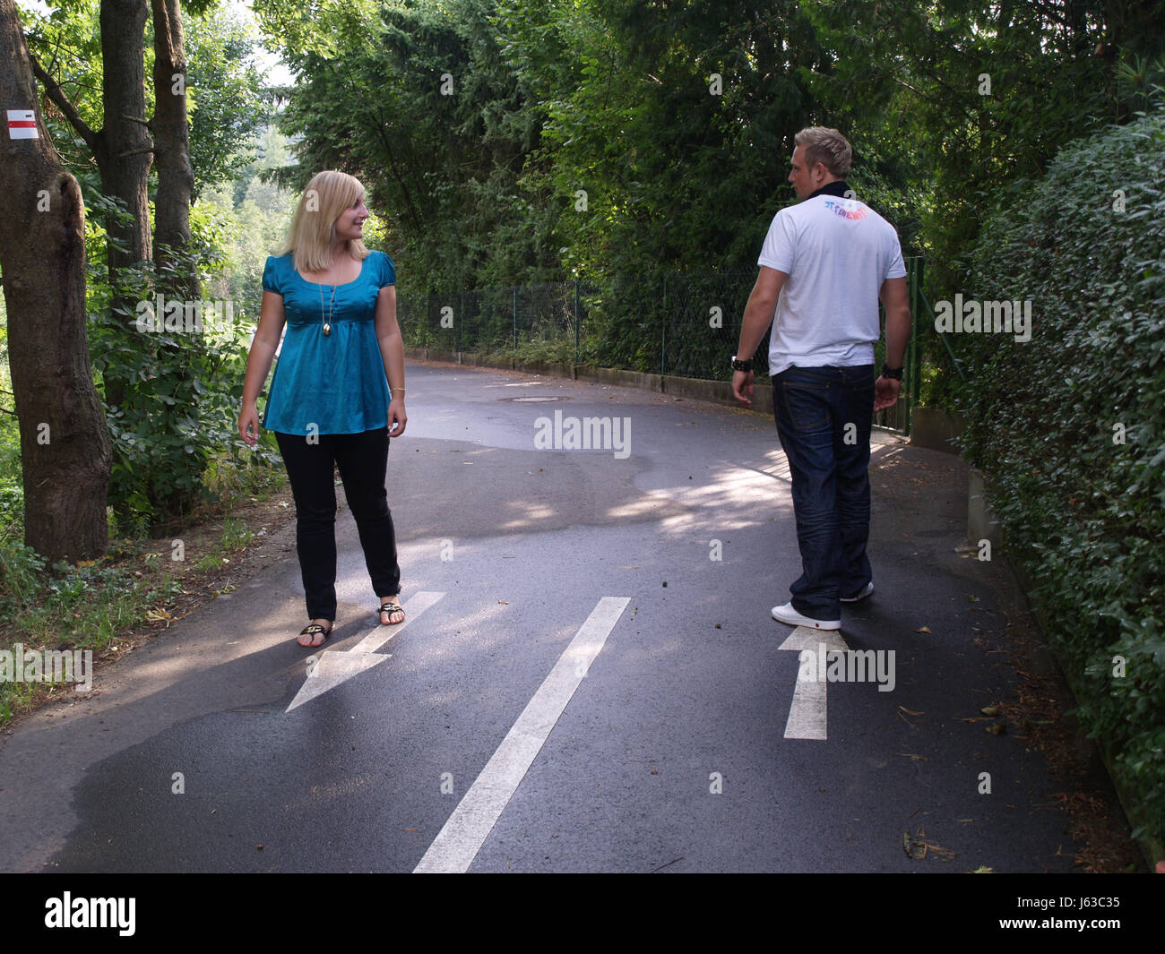 disconnection opposed young younger couple pair arrow woman humans ...