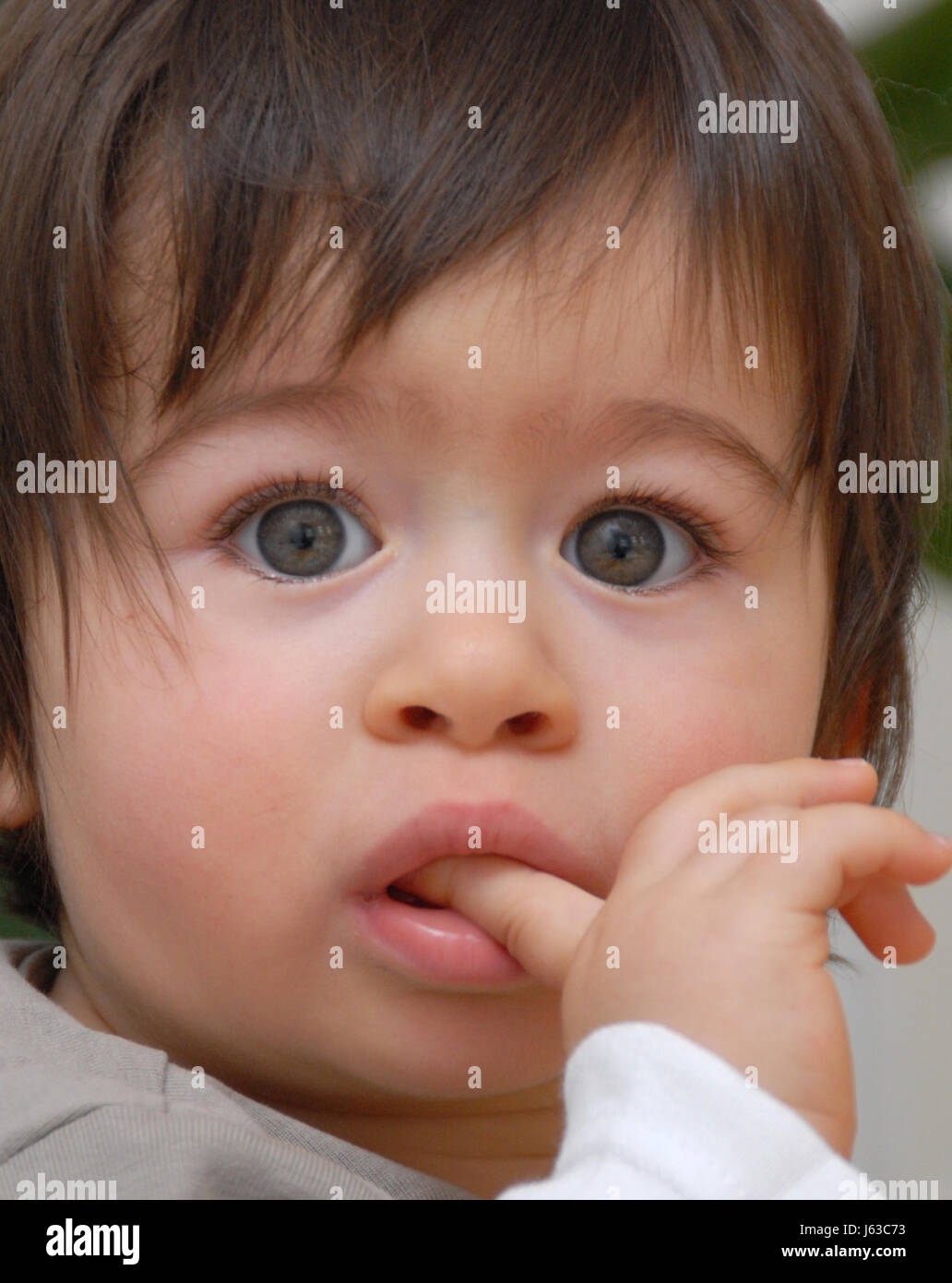 eyes lips baby young younger child toddler head meditative brown ...