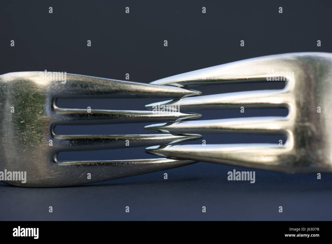 Interlocked fork hi-res stock photography and images - Alamy