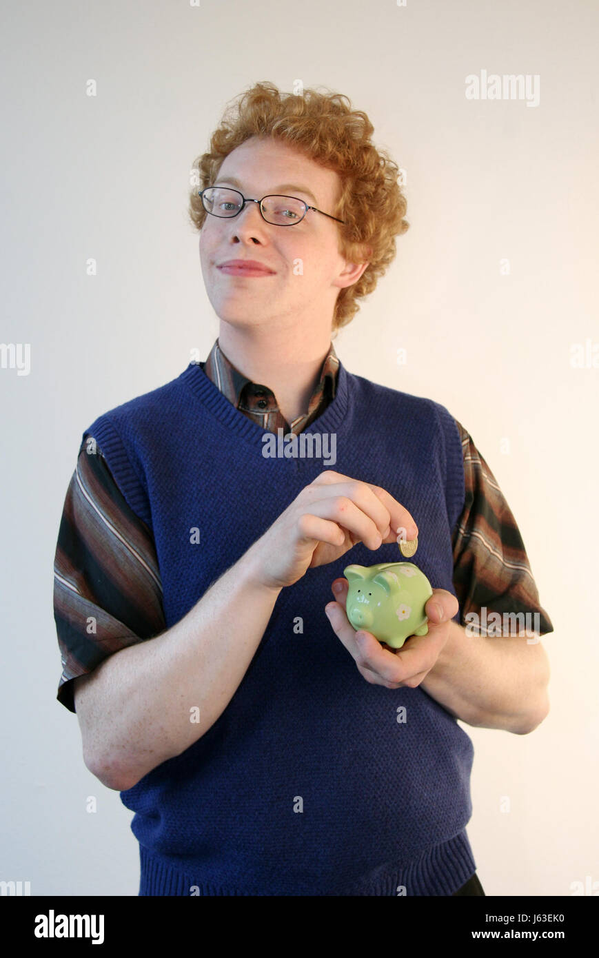 sparfuchs with piggy bank Stock Photo - Alamy