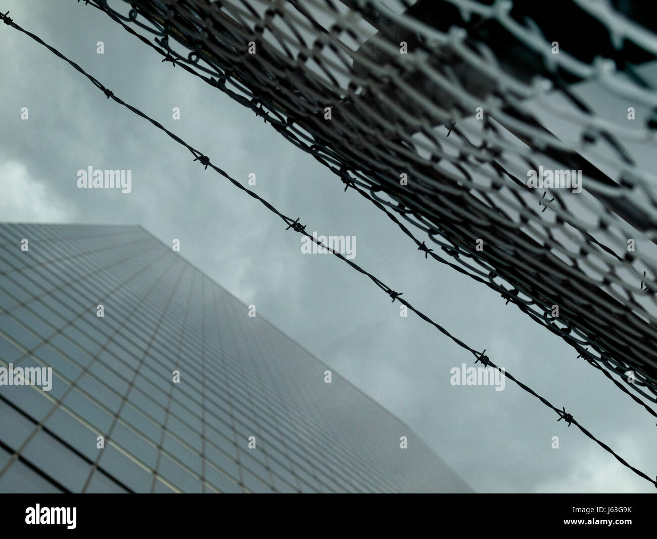 window porthole dormer window pane cloud fence storm firmament sky skyscrapers Stock Photo - Alamy