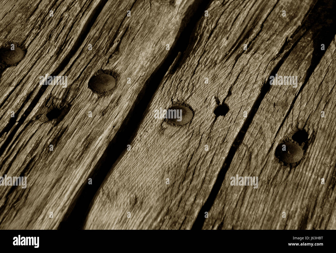 wood beam sepia fissured cracked old wood beam bw diagonal screw idea ...