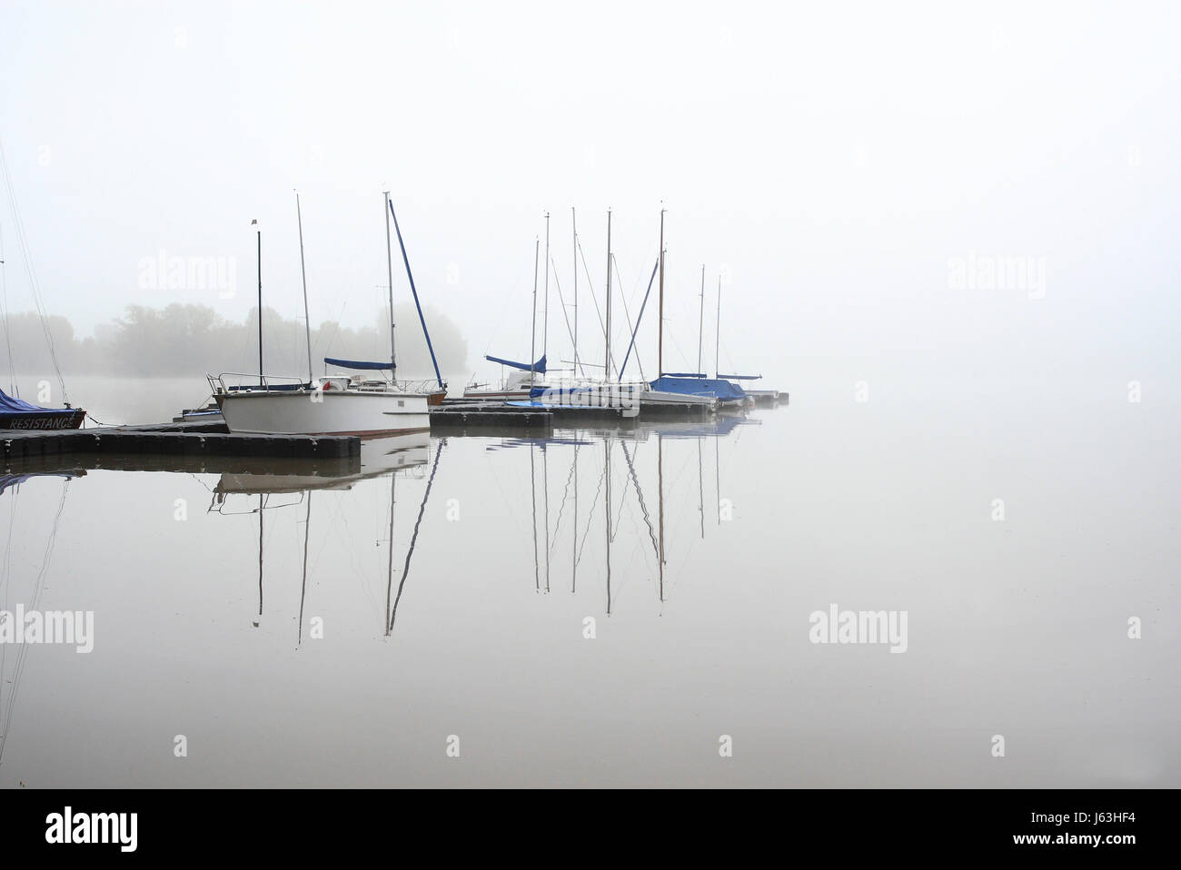 boats in the mist Stock Photo - Alamy