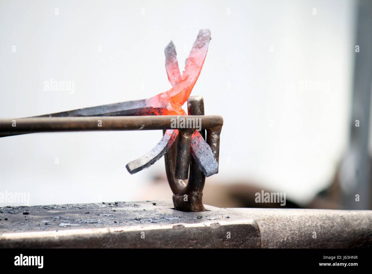 hot iron is shaped Stock Photo - Alamy