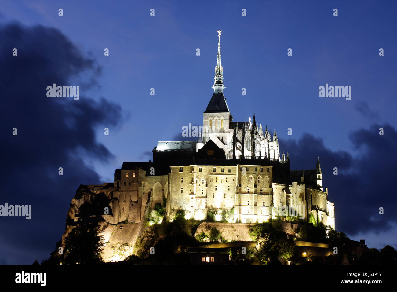 city town night nighttime abbey normandy light cloud europe france ...