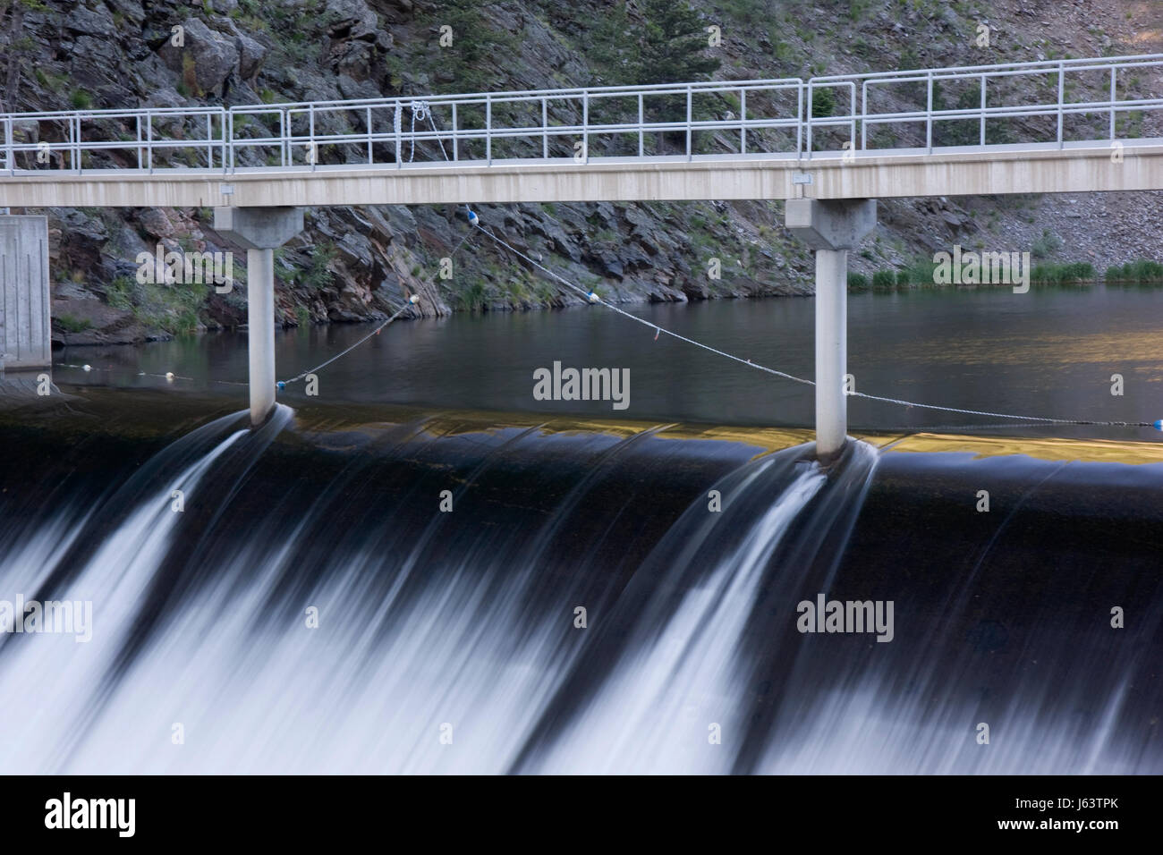 dam embankment footbridge river water flow energy power electricity ...