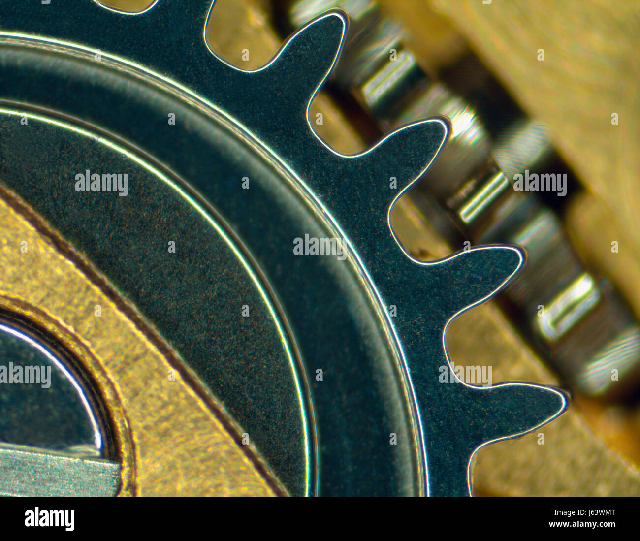 detail wheel clock clockwork cogwheel tooth accuracy macro close-up ...