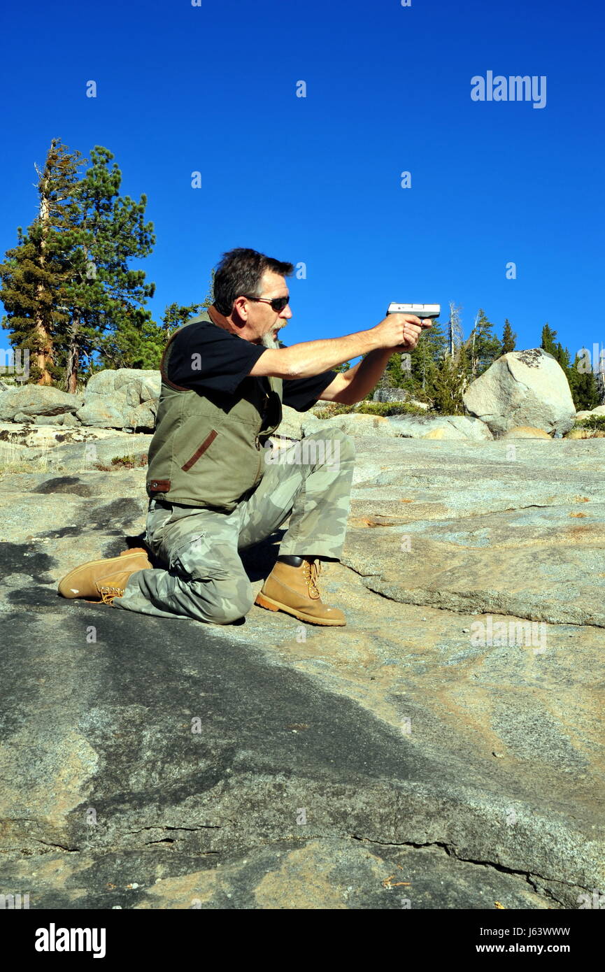 shooting pistol arm weapon revolver gun firearm blue male masculine ...