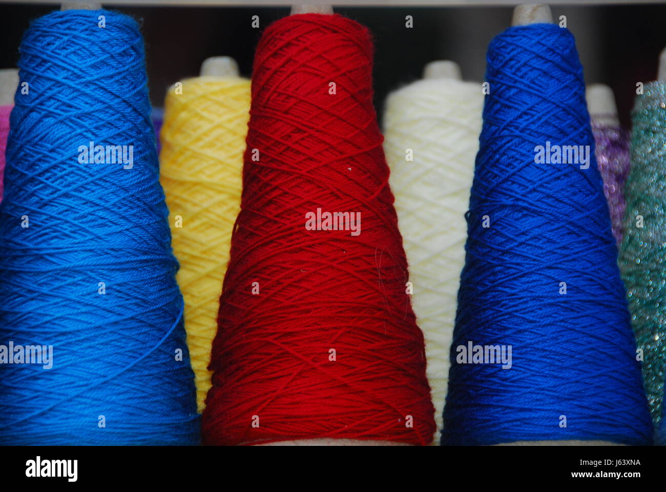 wool string packthreads spindle yarn colorful close blue art wool ...