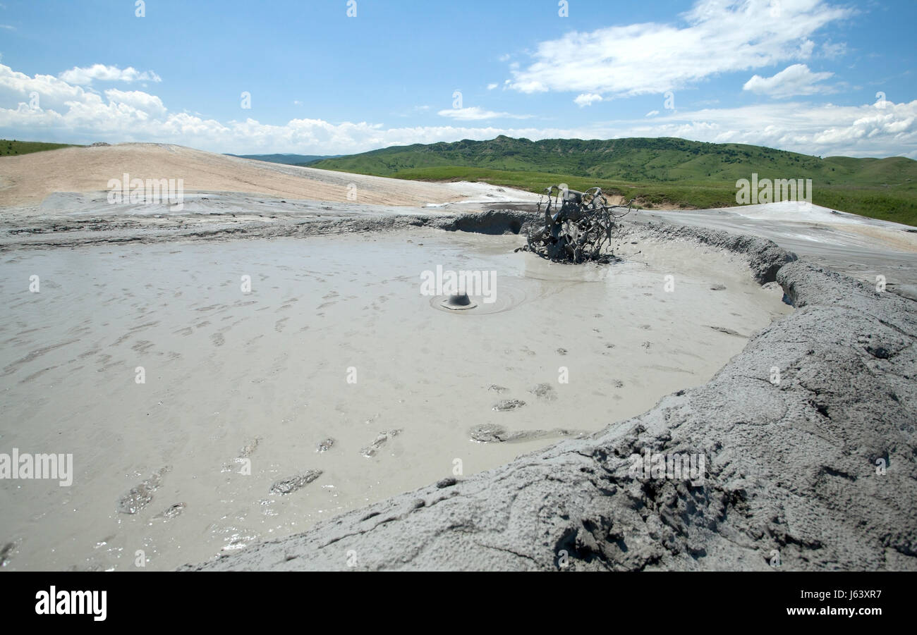 Image of a mud volcano erupting gas Stock Photo - Alamy