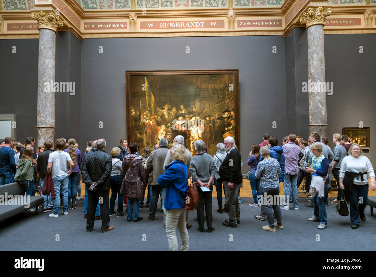 AMSTERDAM, NETHERLANDS - MAY 10, 2017: People watching the picture The ...