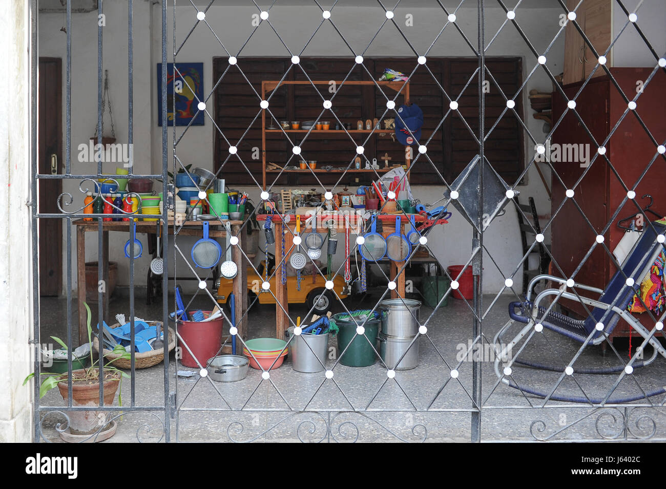 shop behind grids in Havana, Cuba Stock Photo - Alamy