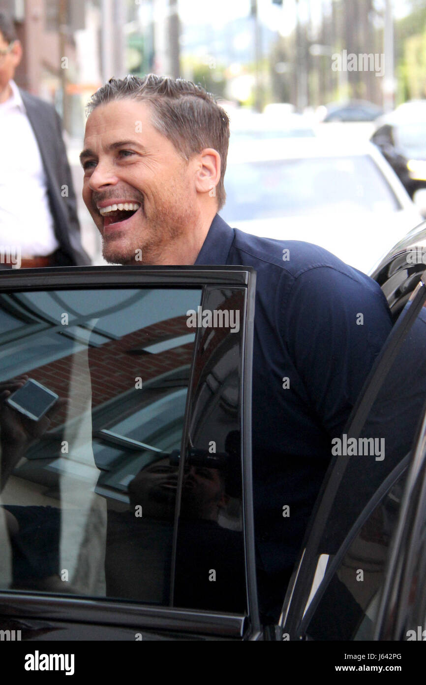 Rob Lowe getting into a waiting car in Beverly Hills, California ...