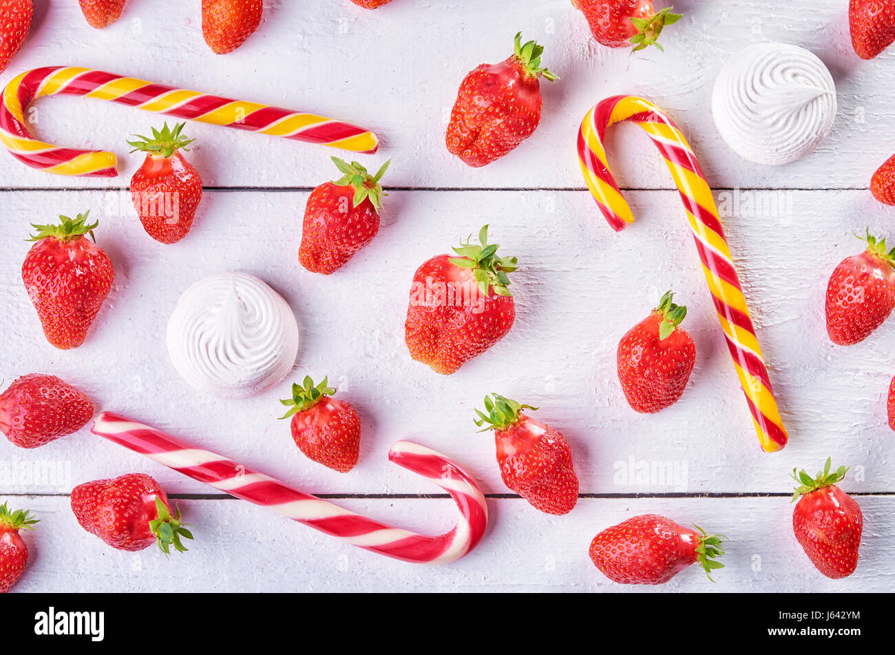 Colorful sweet fruit mix of strawberry, caramel and marshmallows on ...