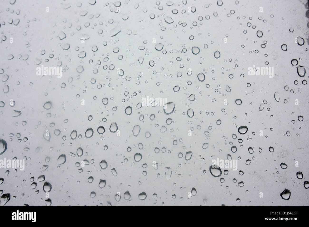 background. wallpaper. Dew, drops of rain on the window. glass. Photo ...