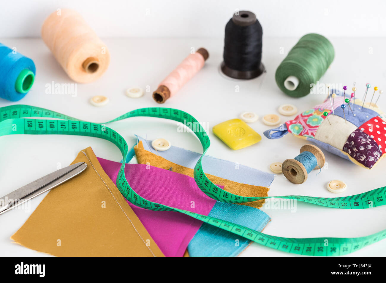 sewing tools, patchwork, tailoring and fashion concept - closeup on ...