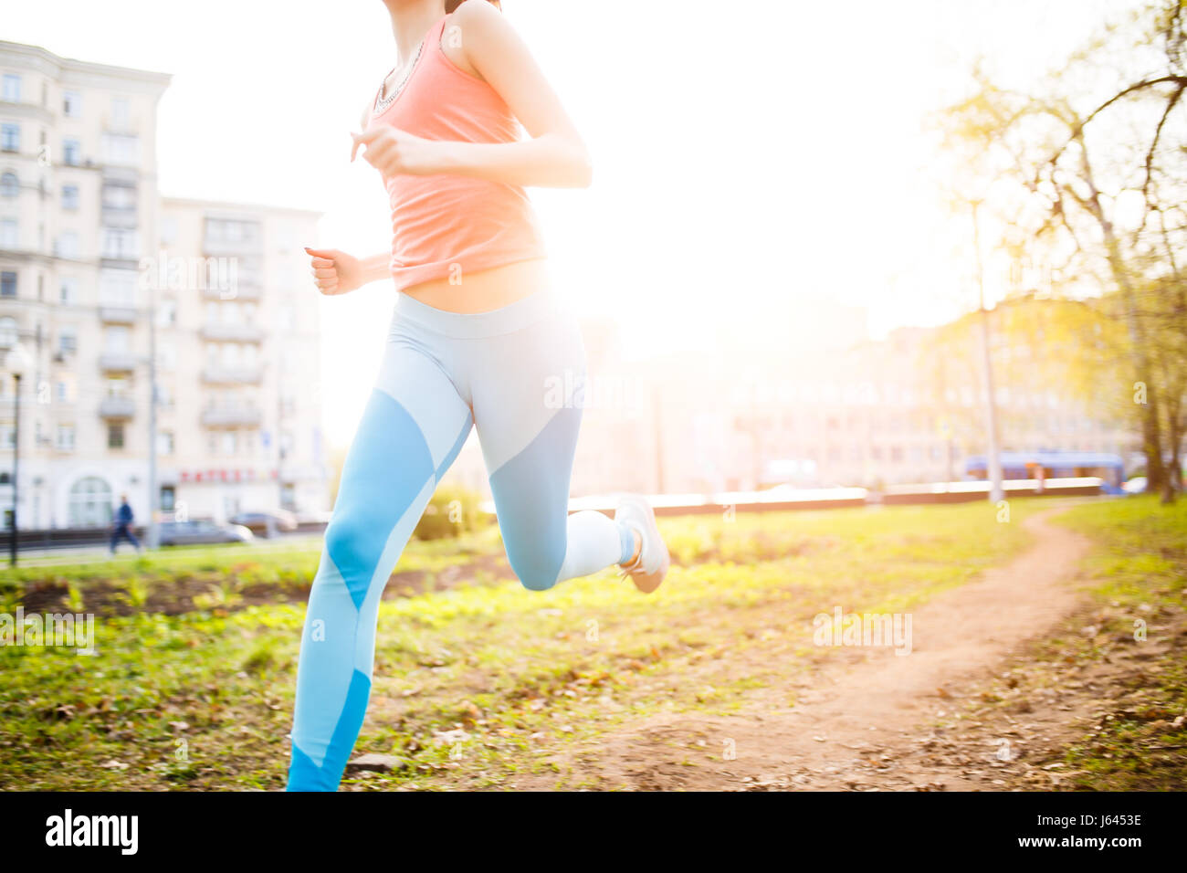Sports girl on morning run Stock Photo - Alamy