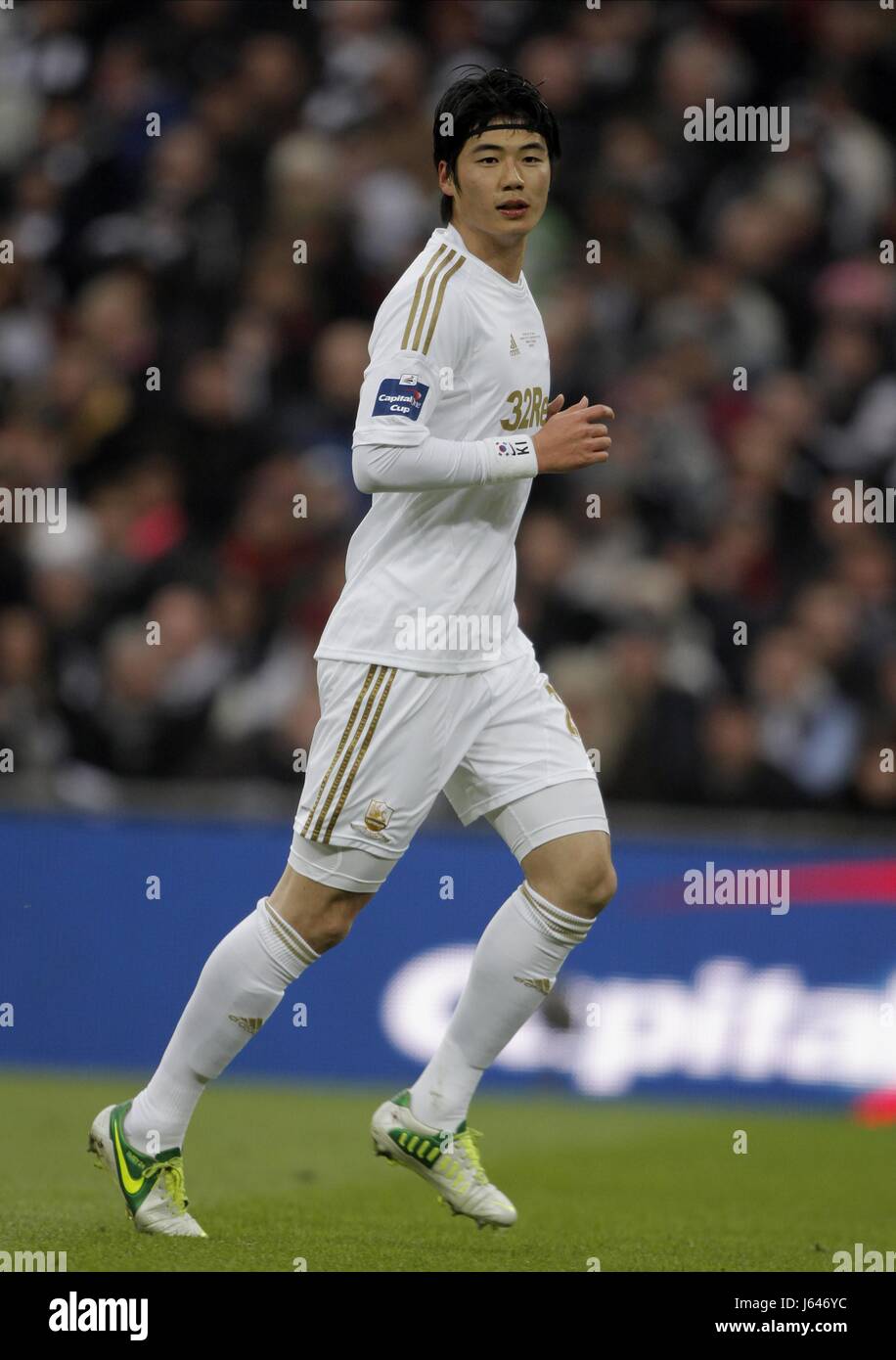 KI SUNG-YONG SWANSEA CITY FC WEMBLEY STADIUM LONDON ENGLAND 24 February ...