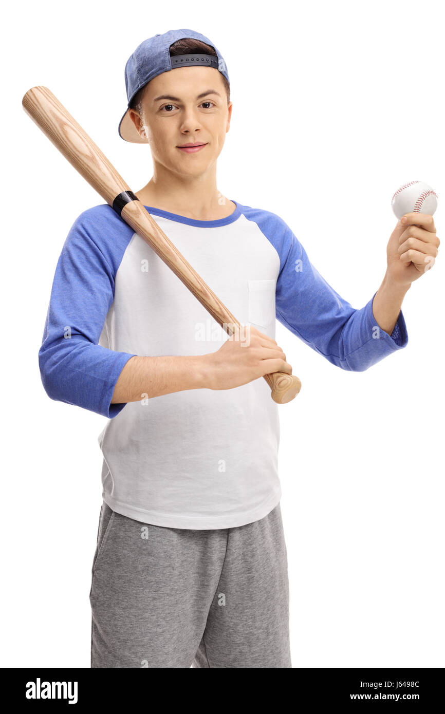 Teenage boy with a baseball and a bat looking at the camera isolated on ...