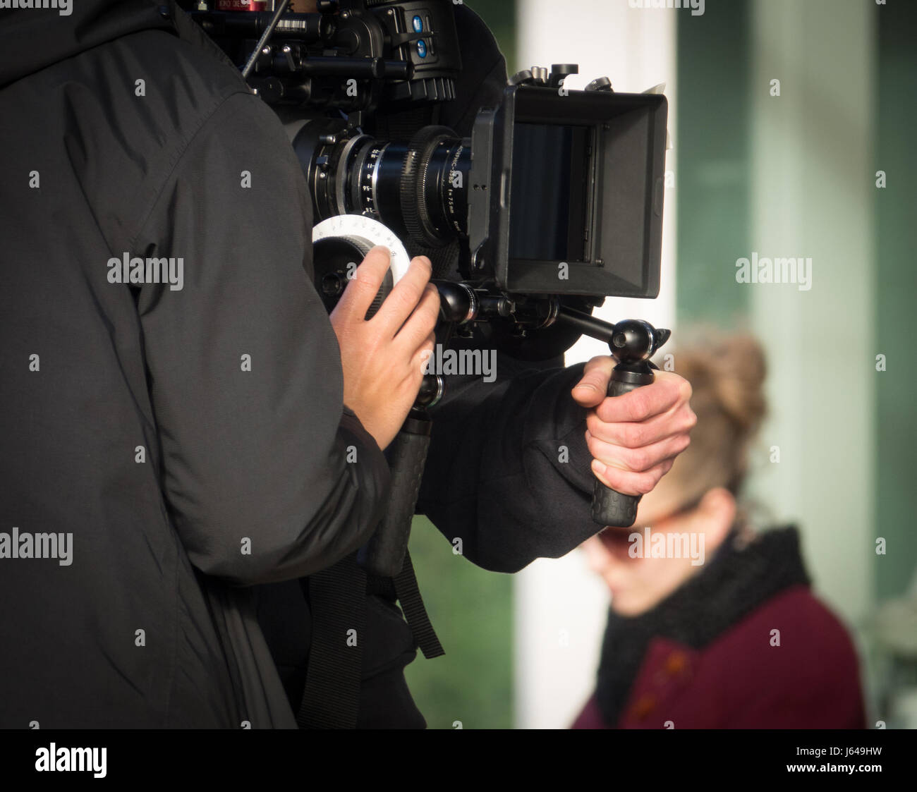 A Cameraman Shooting A Movie Stock Photo - Alamy