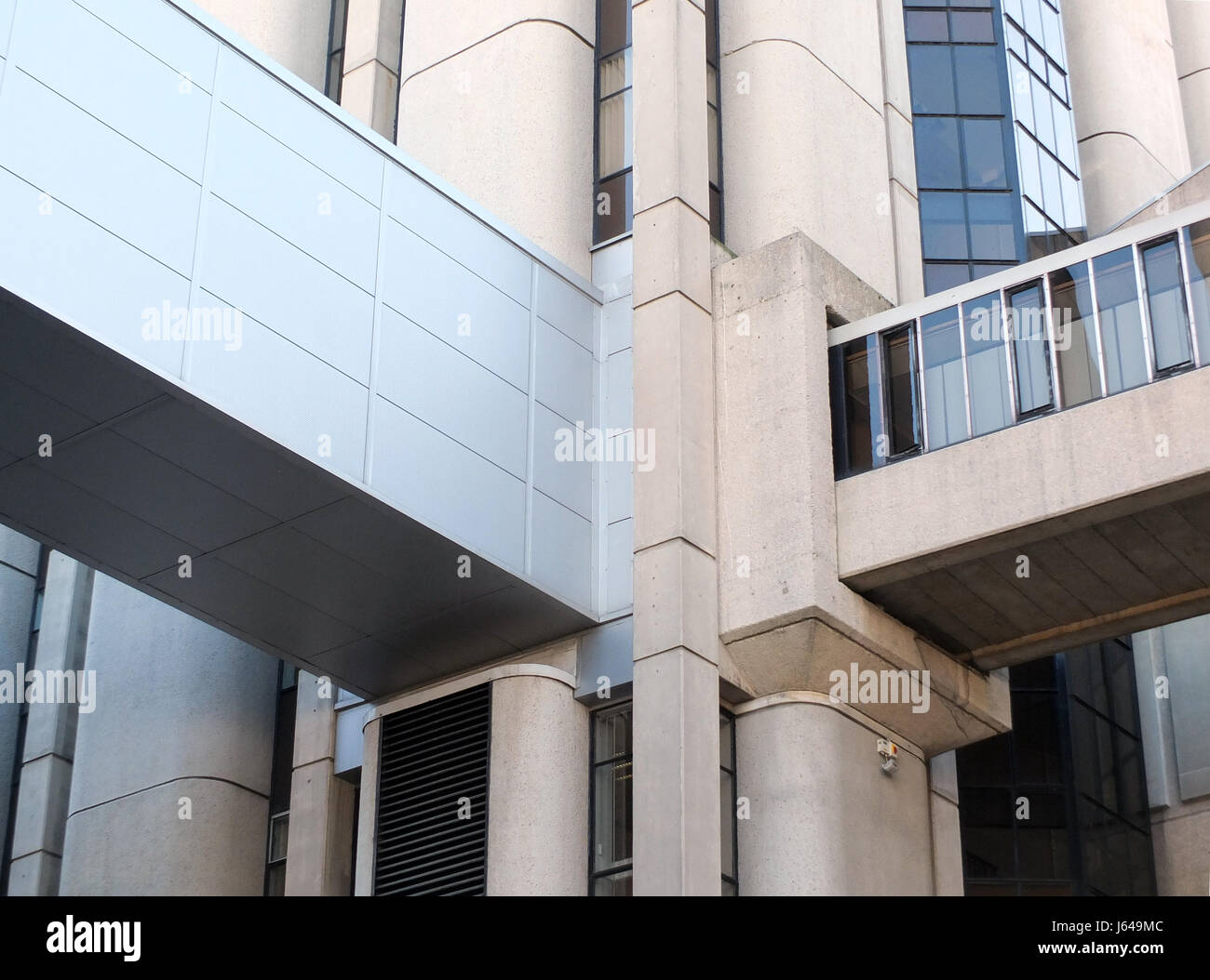 geometric angular concrete building with walkways Stock Photo - Alamy