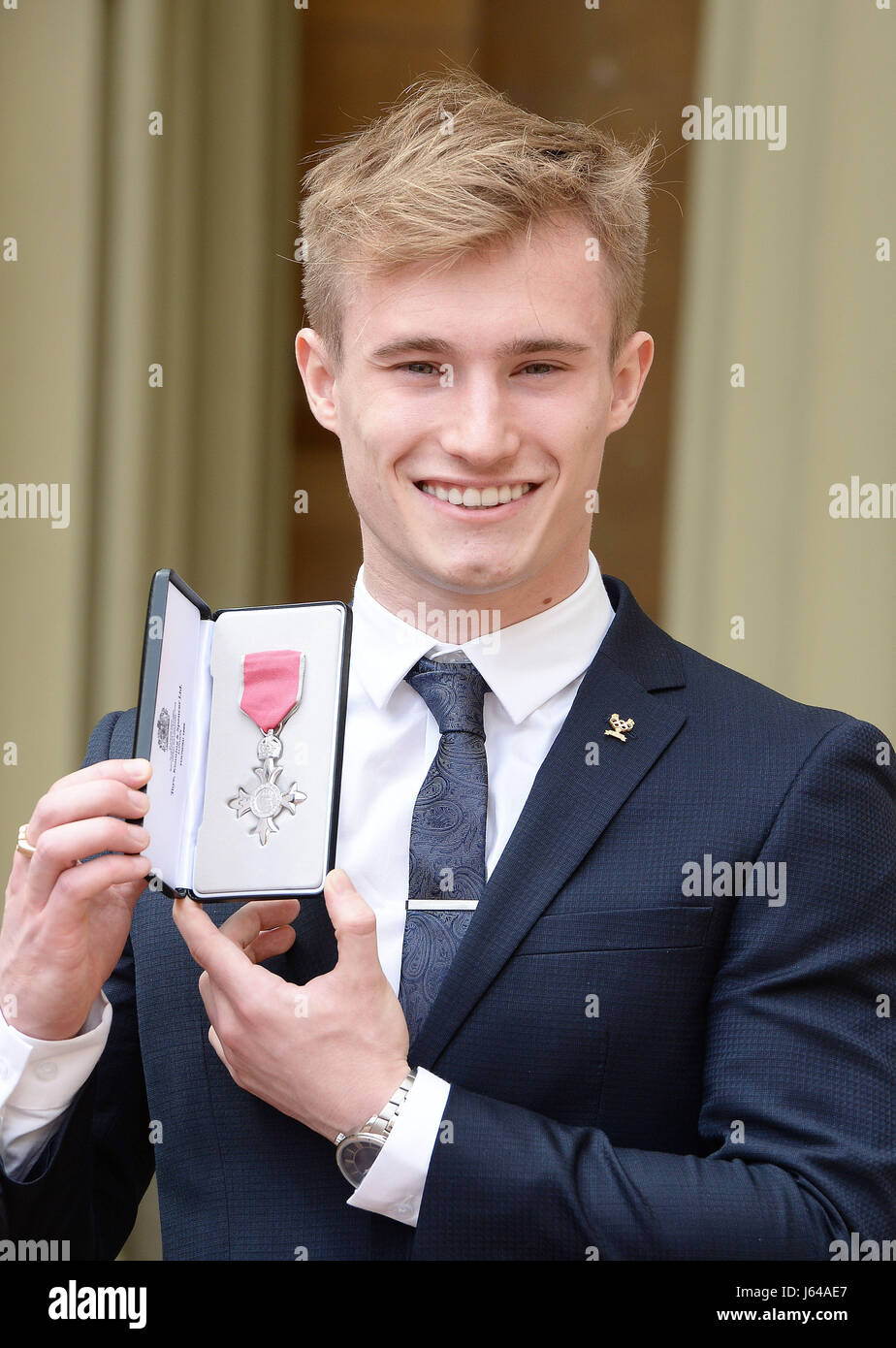 Olympic diver Jack Laugher after he was awarded an MBE by the Prince of ...