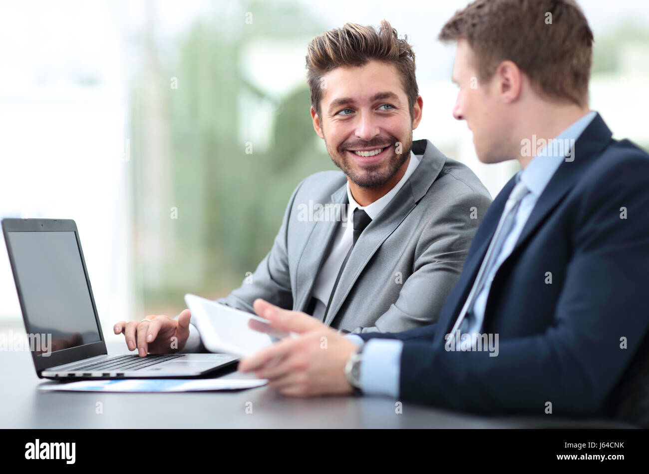 Image of two business people interacting at meeting in office Stock ...