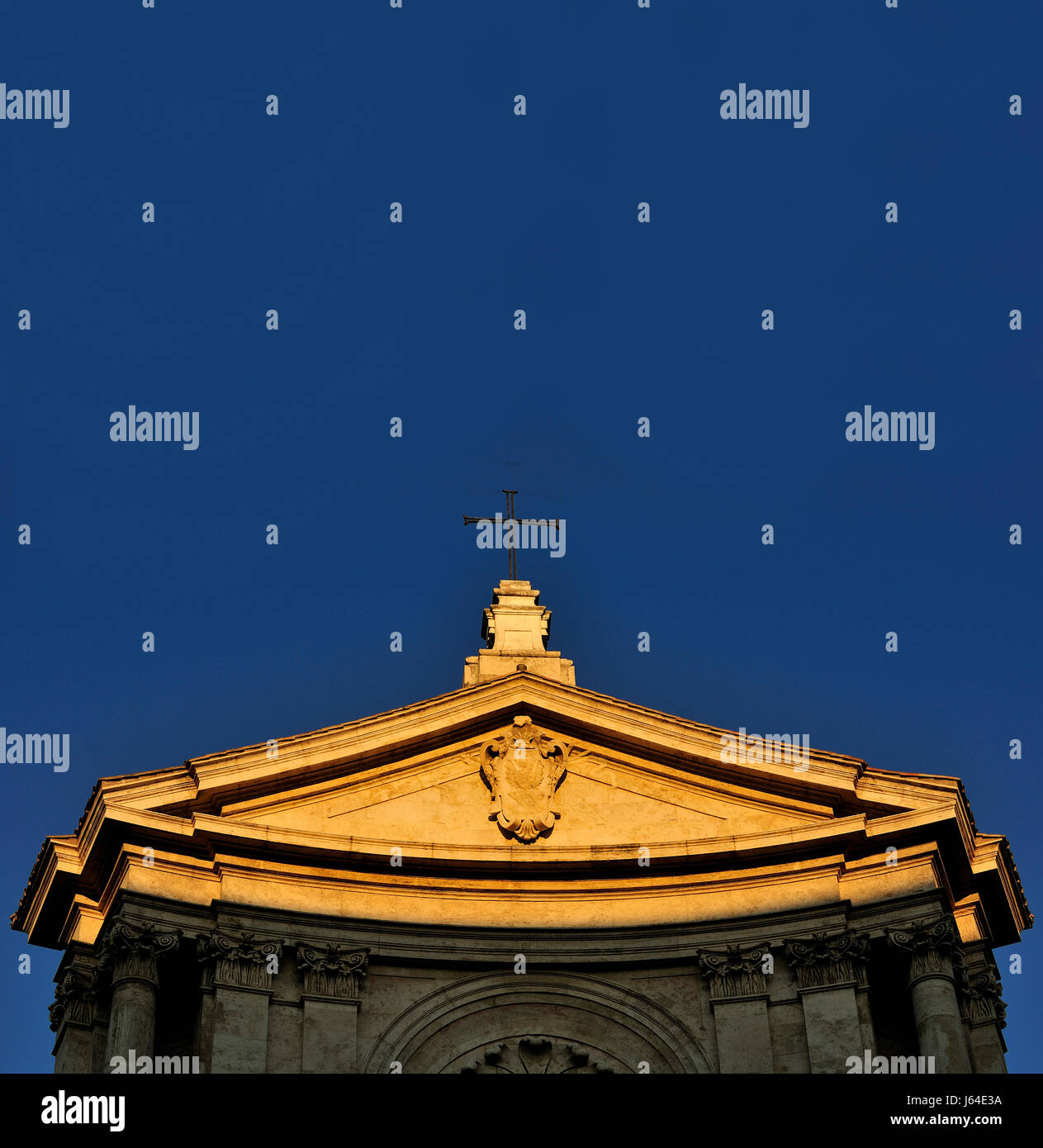 gable top of a church in the evening light Stock Photo - Alamy