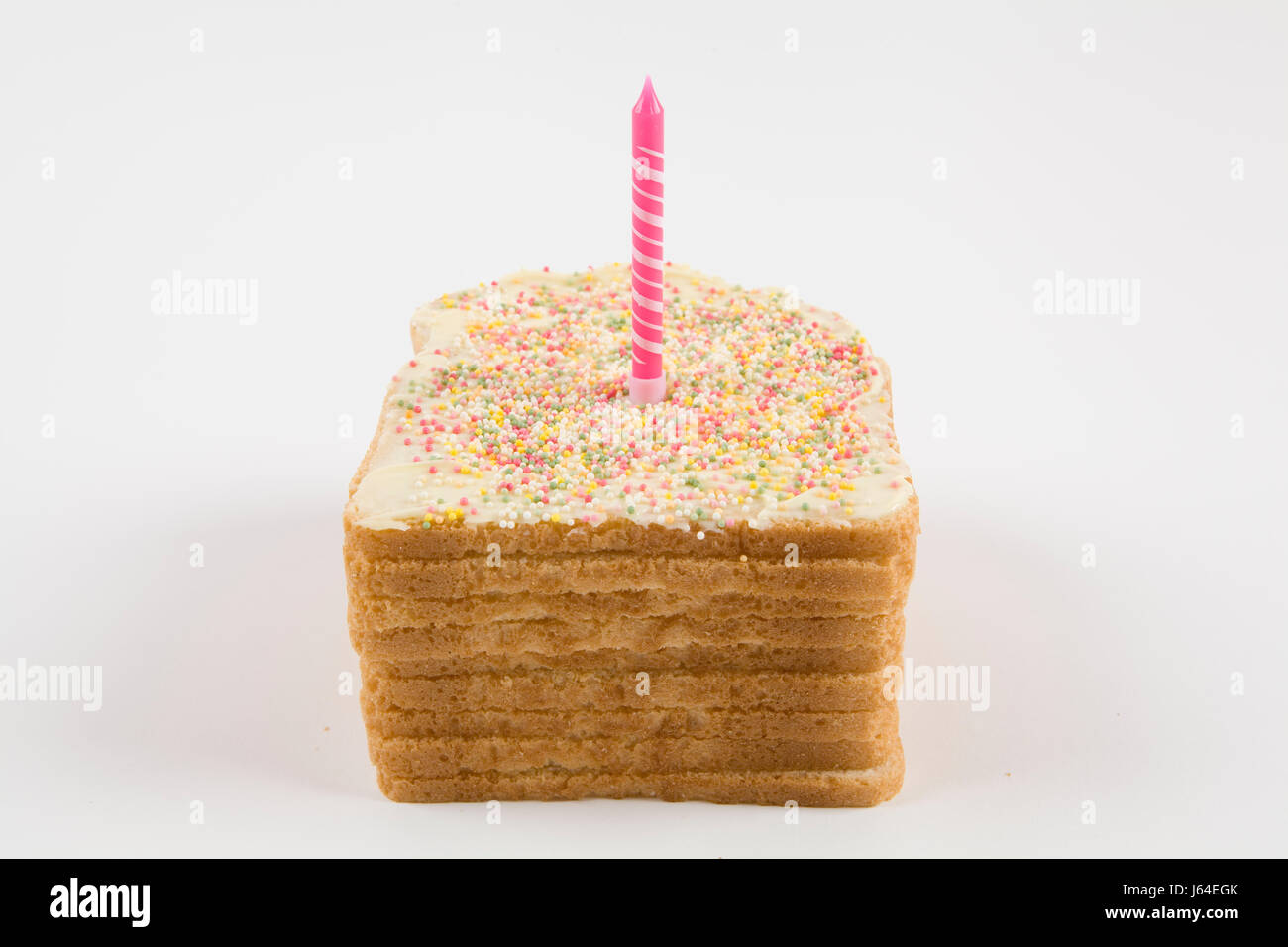 a quirky icing birthday bread covered with sprinkles on white ...