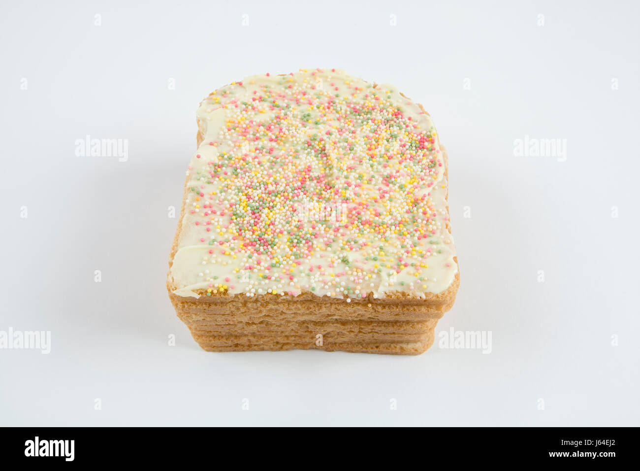 a quirky icing birthday bread covered with sprinkles on white ...