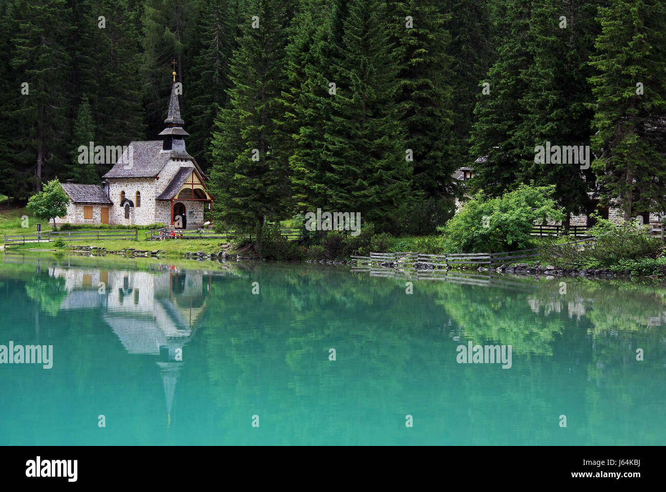 chapel at the mountain lake Stock Photo - Alamy
