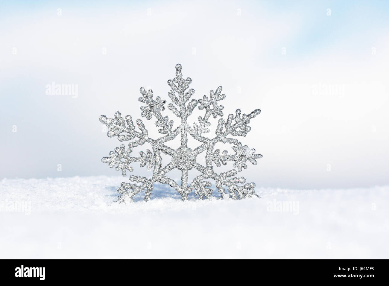 snowflake in snow Stock Photo - Alamy