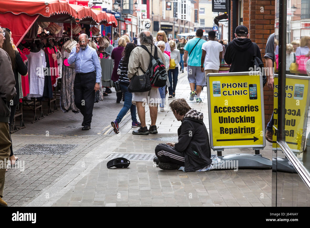 MALE BEGGING FOR MONEY IN THE STREET Stock Photo - Alamy