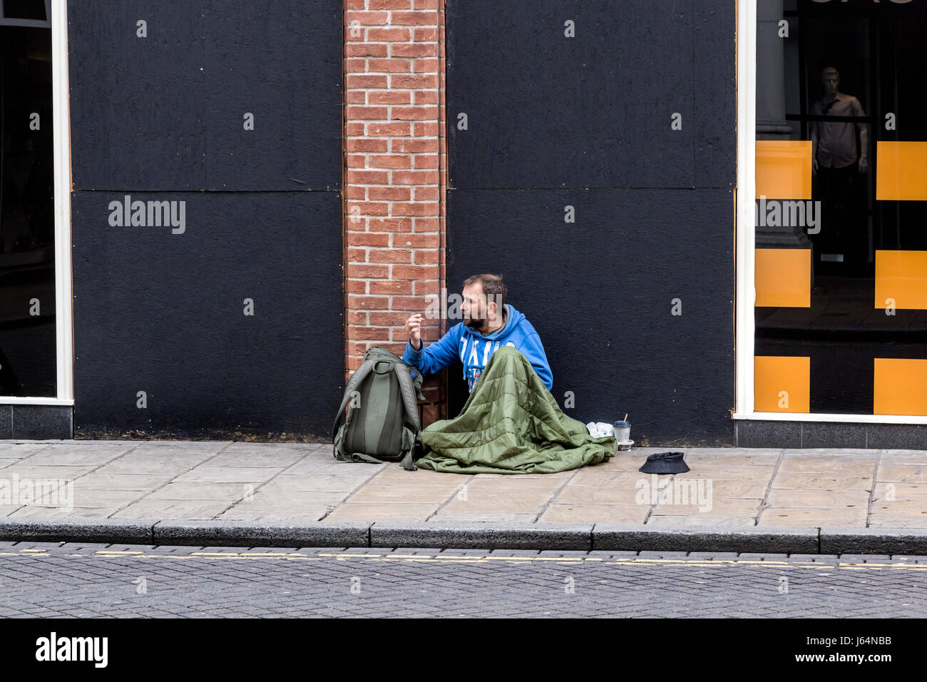 Poor homeless man begging street money alone homeless hi-res stock ...
