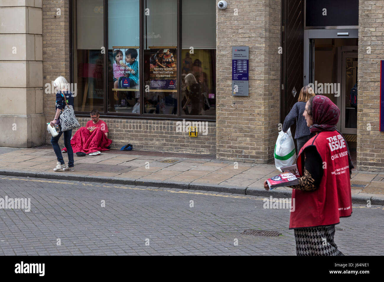 MALE BEGGING FOR MONEY IN THE STREET AND A BIG ISSUE SELLER TRYING TO ...