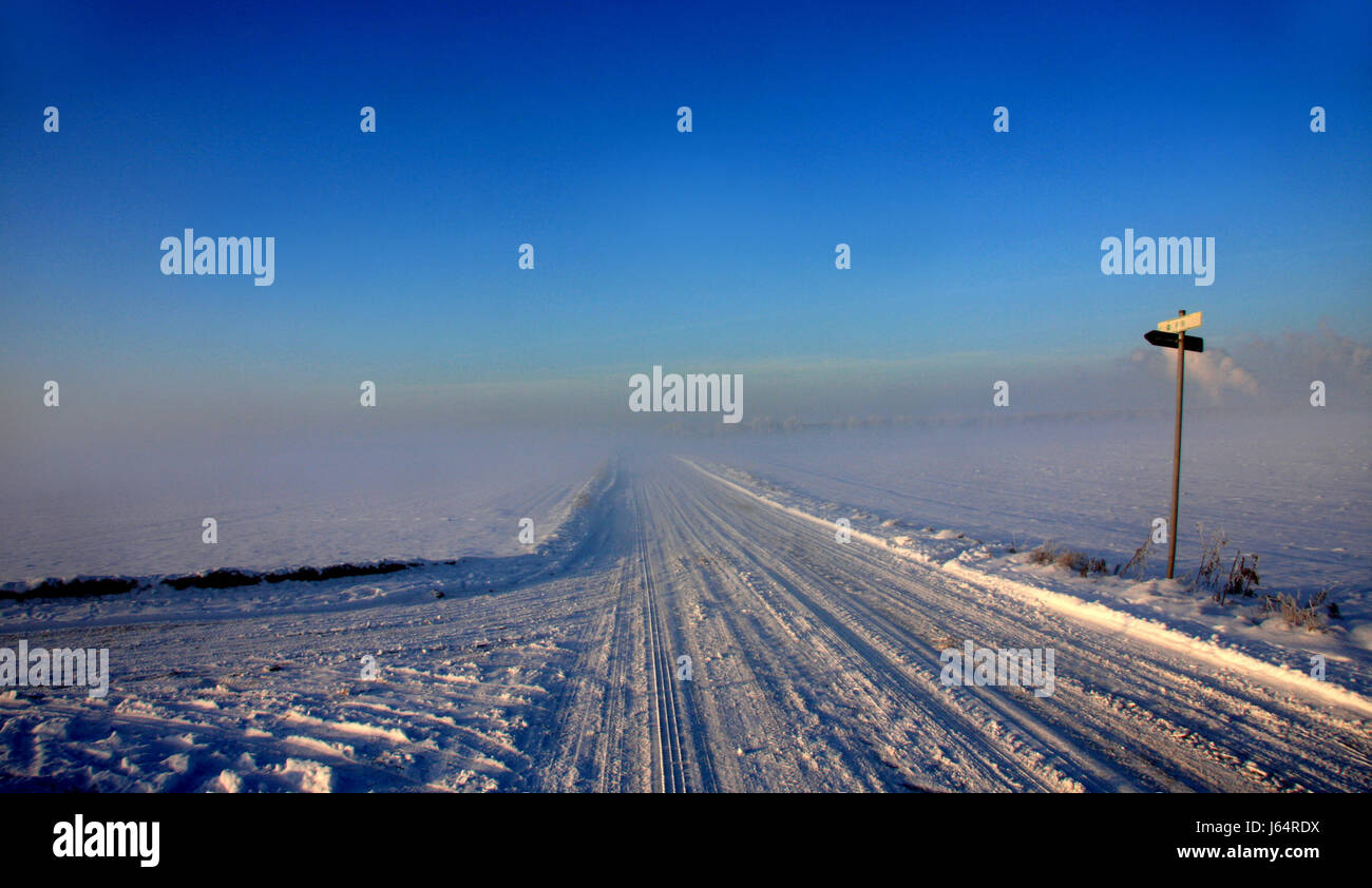 sign signal winter fog sense path way firmament sky snow tracks ...