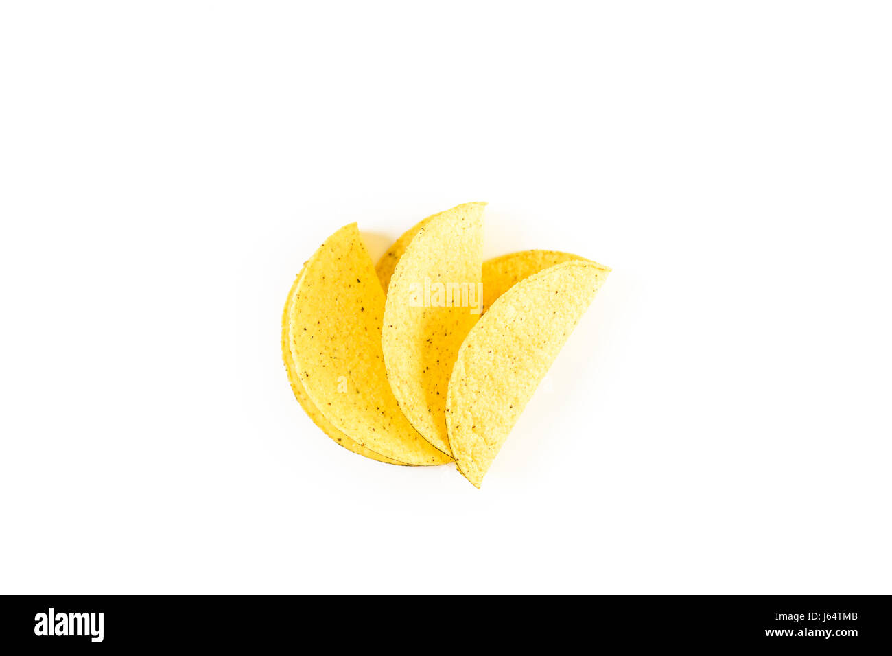 Yellow corn taco shells on a white background Stock Photo - Alamy