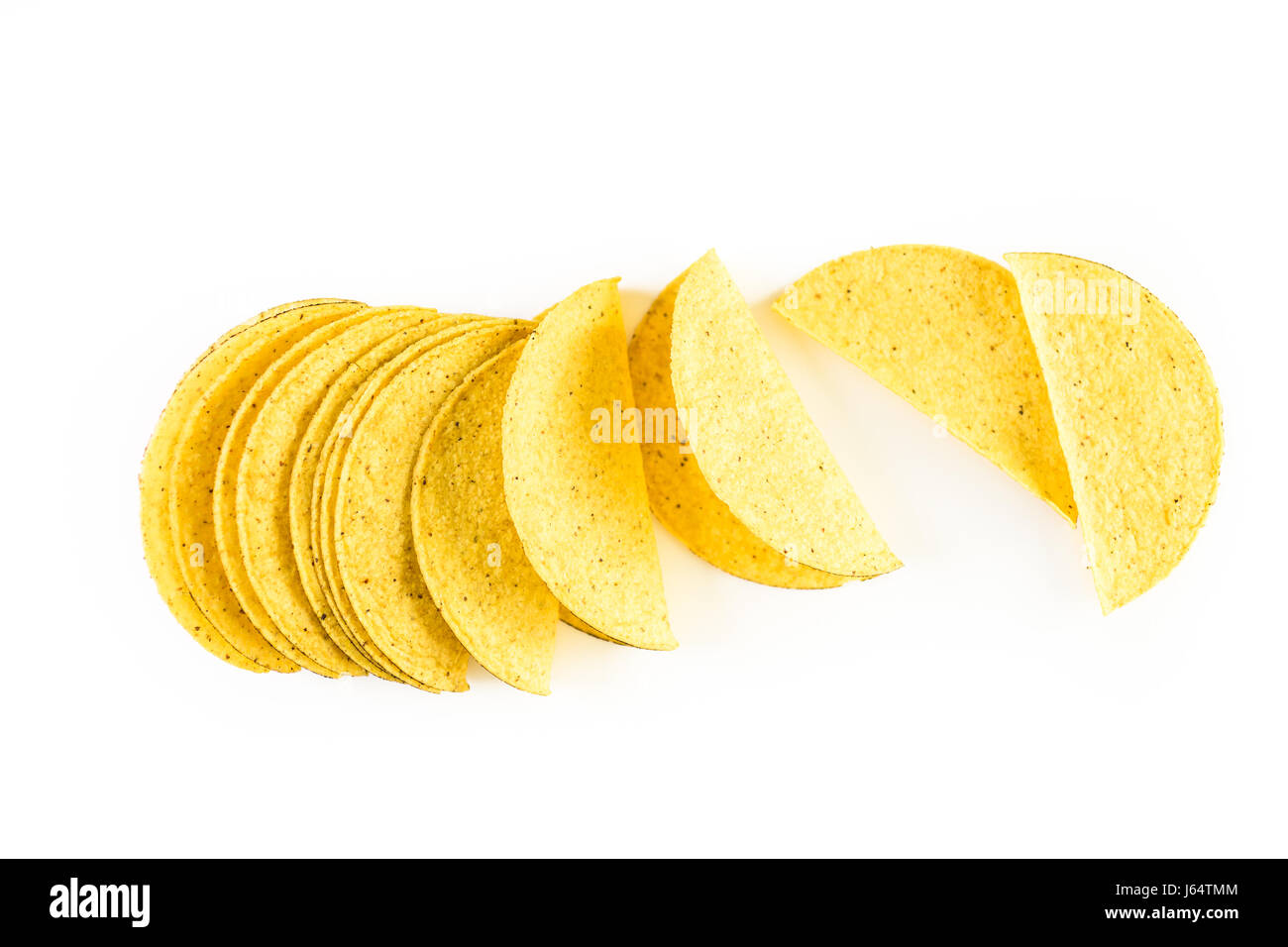 Yellow corn taco shells on a white background Stock Photo - Alamy