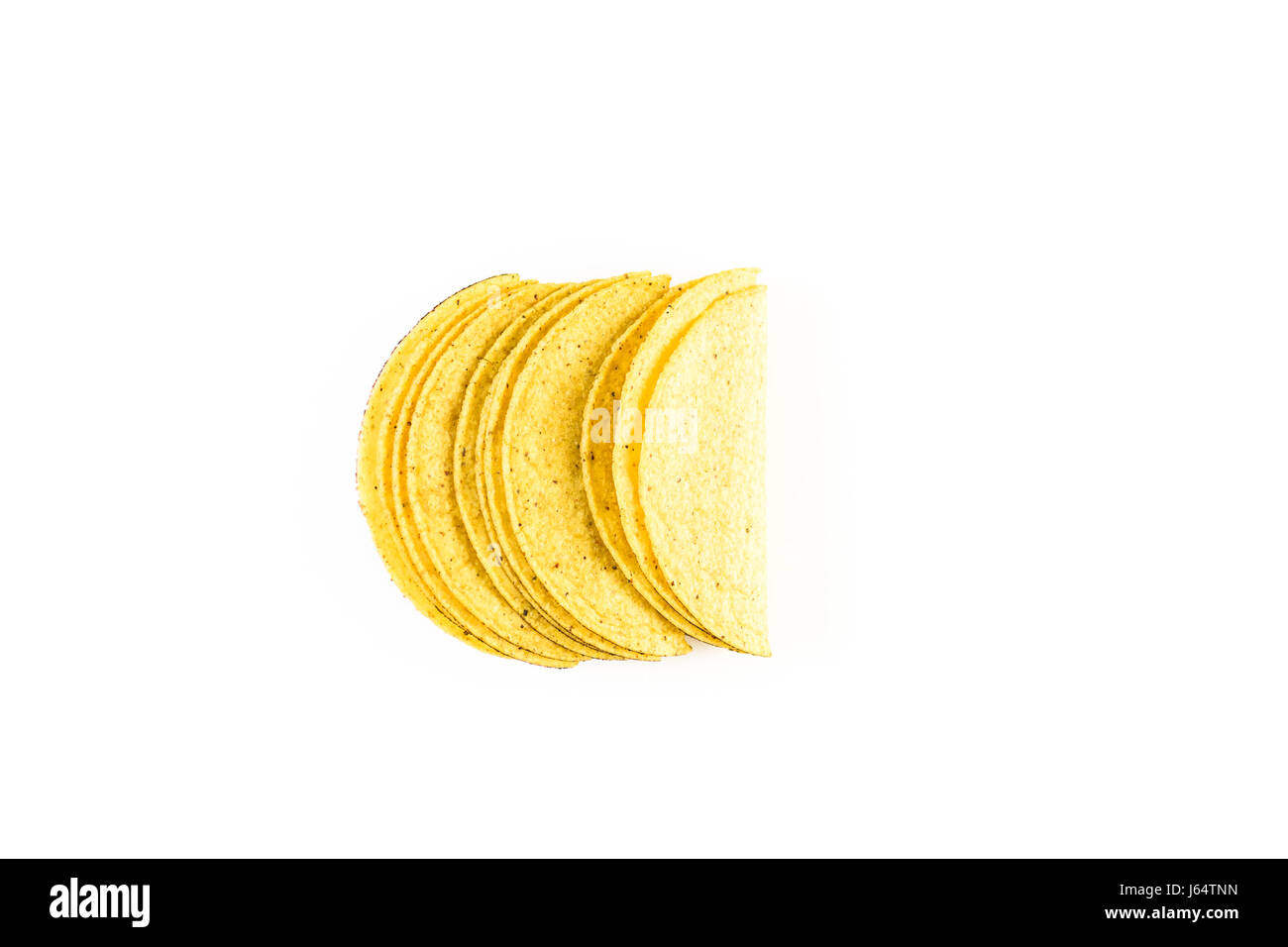 Yellow corn taco shells on a white background Stock Photo - Alamy