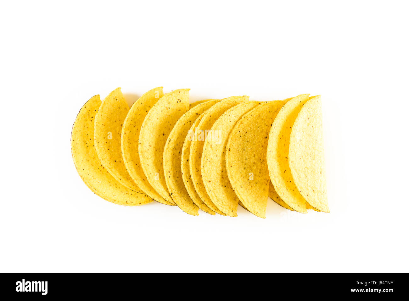 Yellow corn taco shells on a white background Stock Photo - Alamy