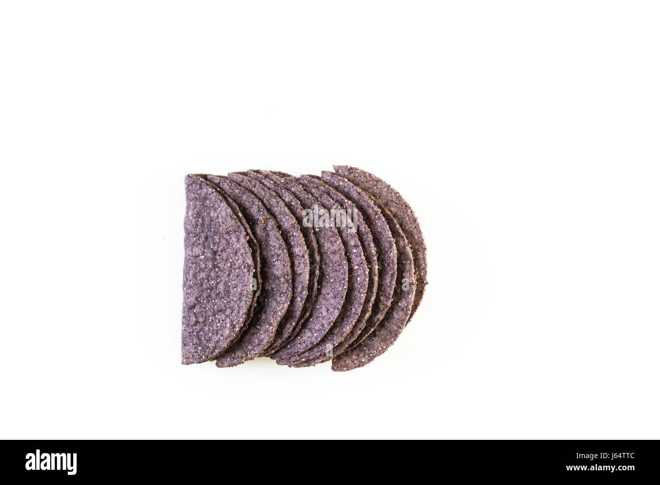 Blue corn taco shells on a white background Stock Photo - Alamy