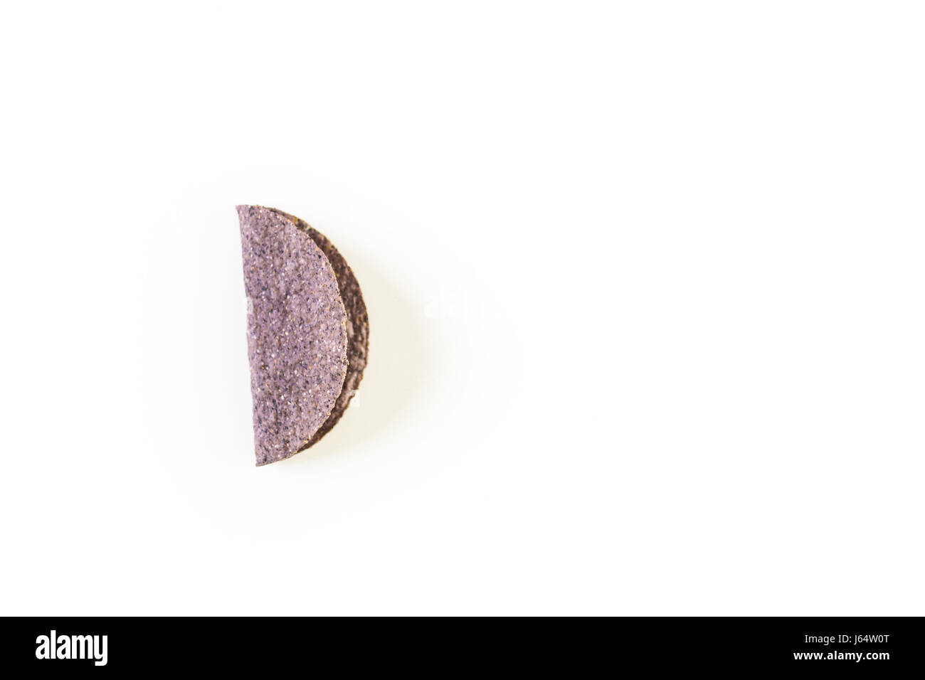 Blue corn taco shells on a white background Stock Photo - Alamy
