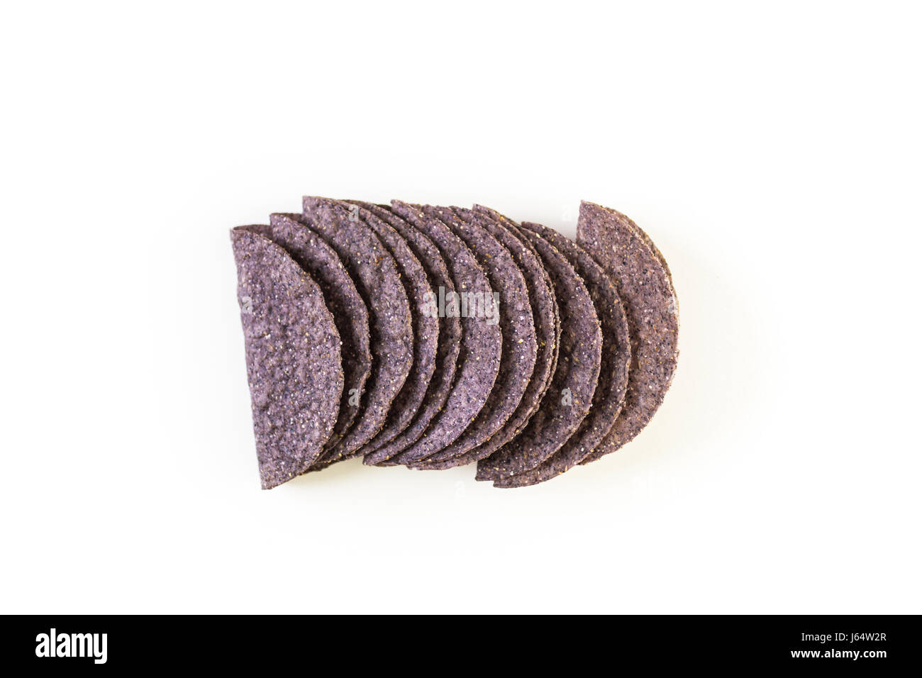 Blue corn taco shells on a white background Stock Photo - Alamy