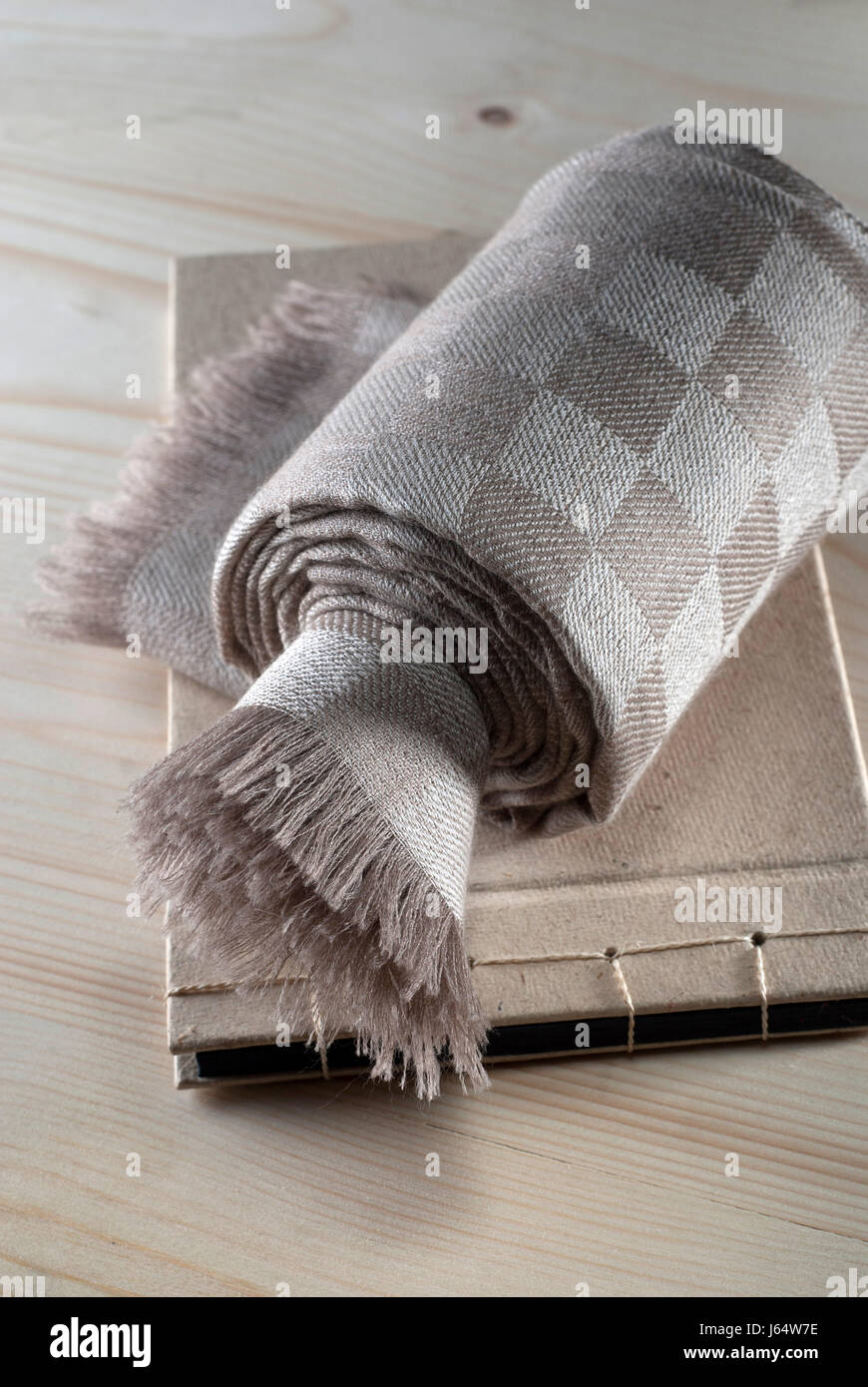 Cloth in a art form on a wooden base or white Stock Photo - Alamy