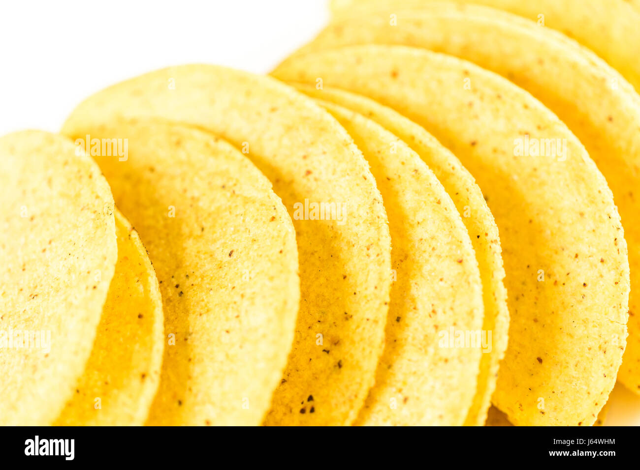 Yellow corn taco shells on a white background Stock Photo - Alamy
