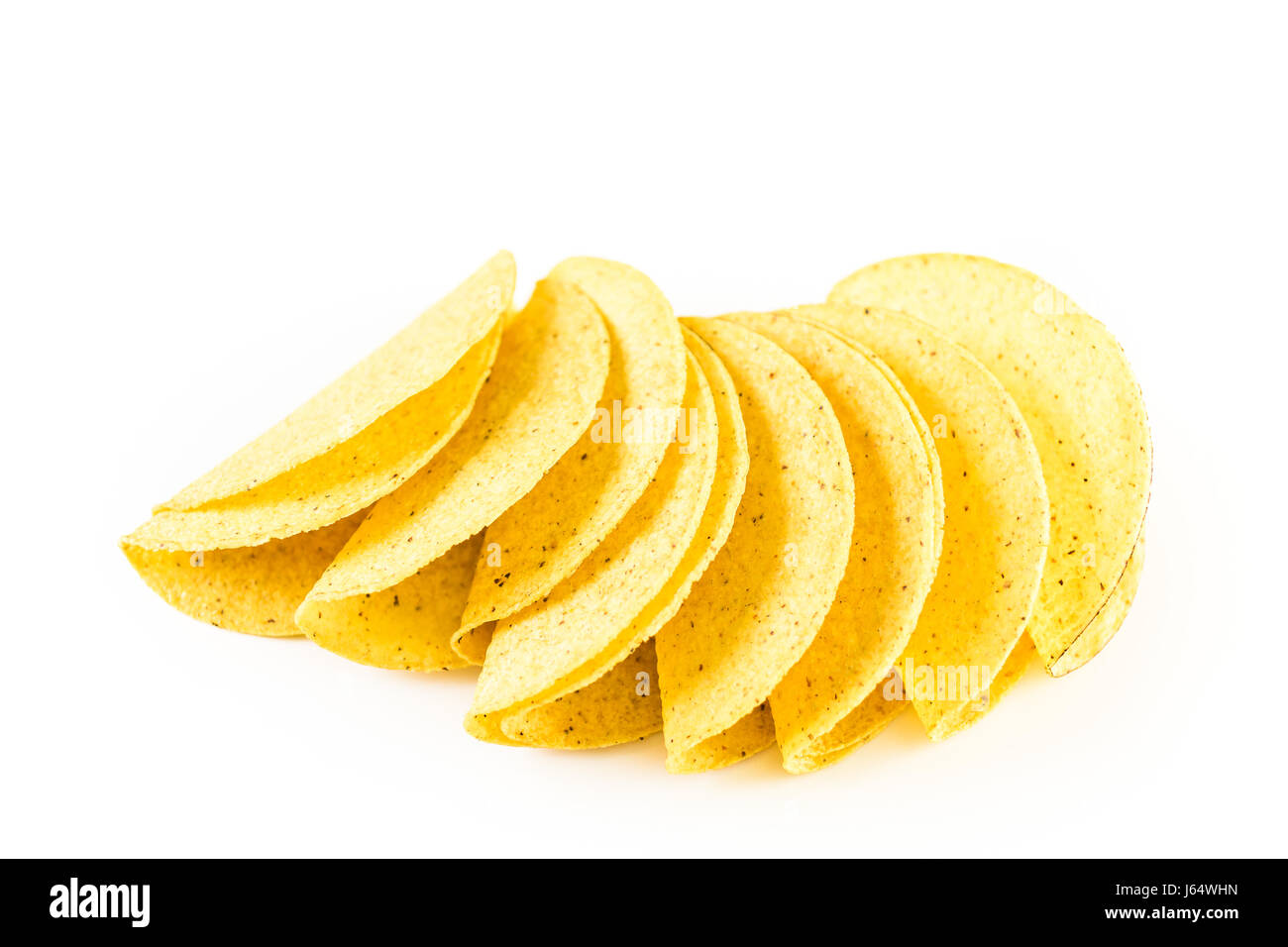 Yellow corn taco shells on a white background Stock Photo - Alamy