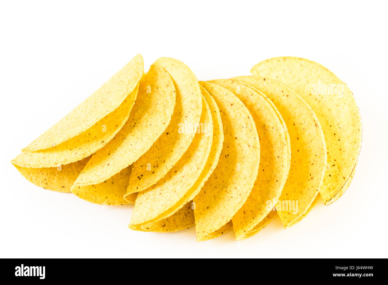 Yellow corn taco shells on a white background Stock Photo - Alamy