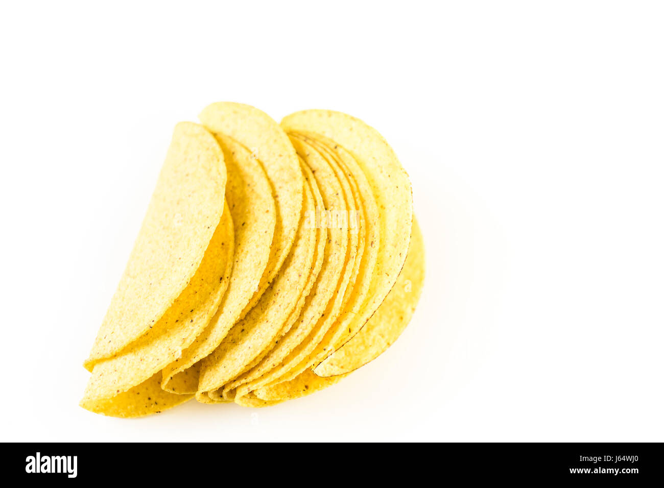 Yellow corn taco shells on a white background Stock Photo - Alamy