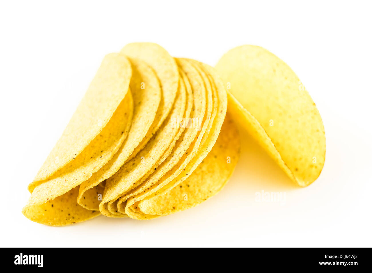 Yellow corn taco shells on a white background Stock Photo - Alamy
